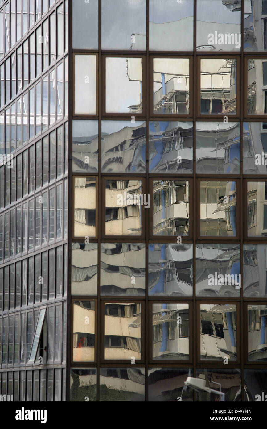 Reflection in windows of building Stock Photo - Alamy