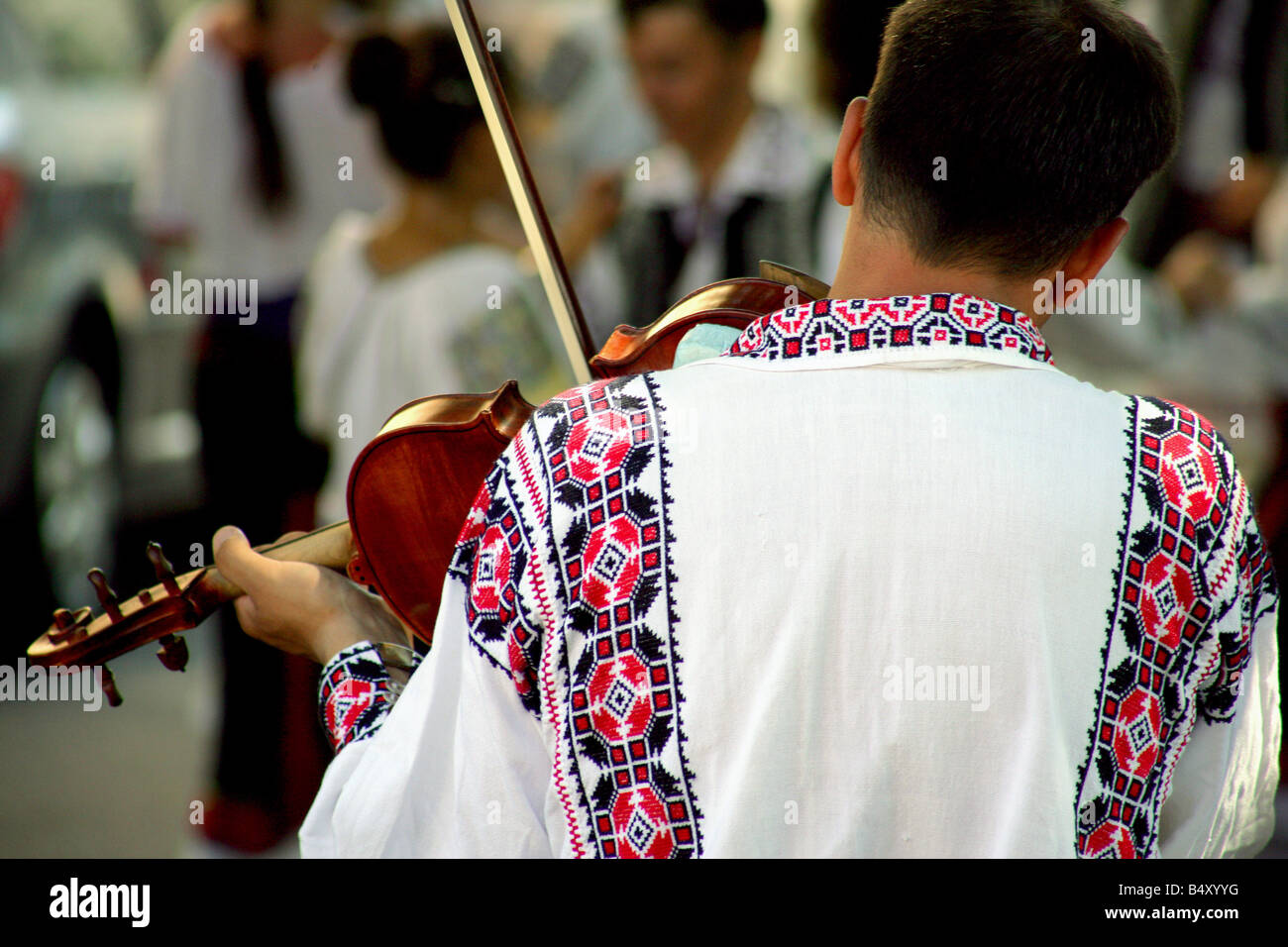 Man playing violin, rear view Stock Photo - Alamy