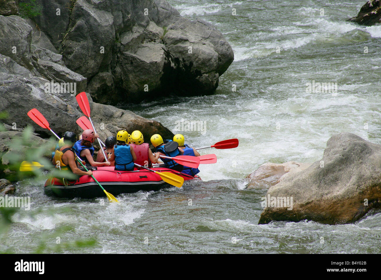 People water rafting in stream Stock Photo - Alamy
