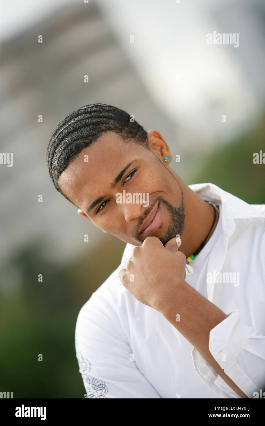 Portrait of a young man metis smiling Stock Photo - Alamy