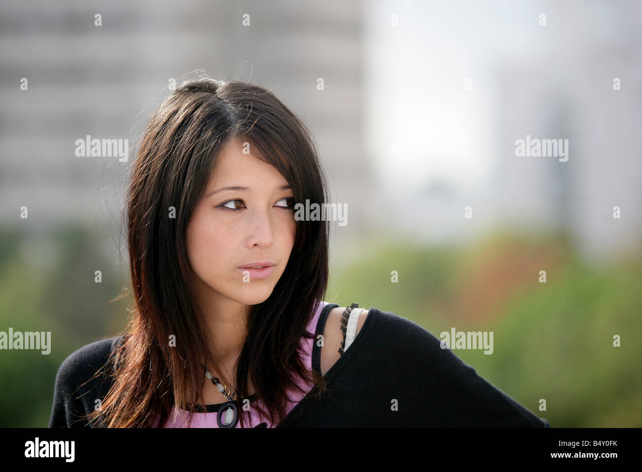 Portrait of Eurasian girl outdoors Stock Photo - Alamy
