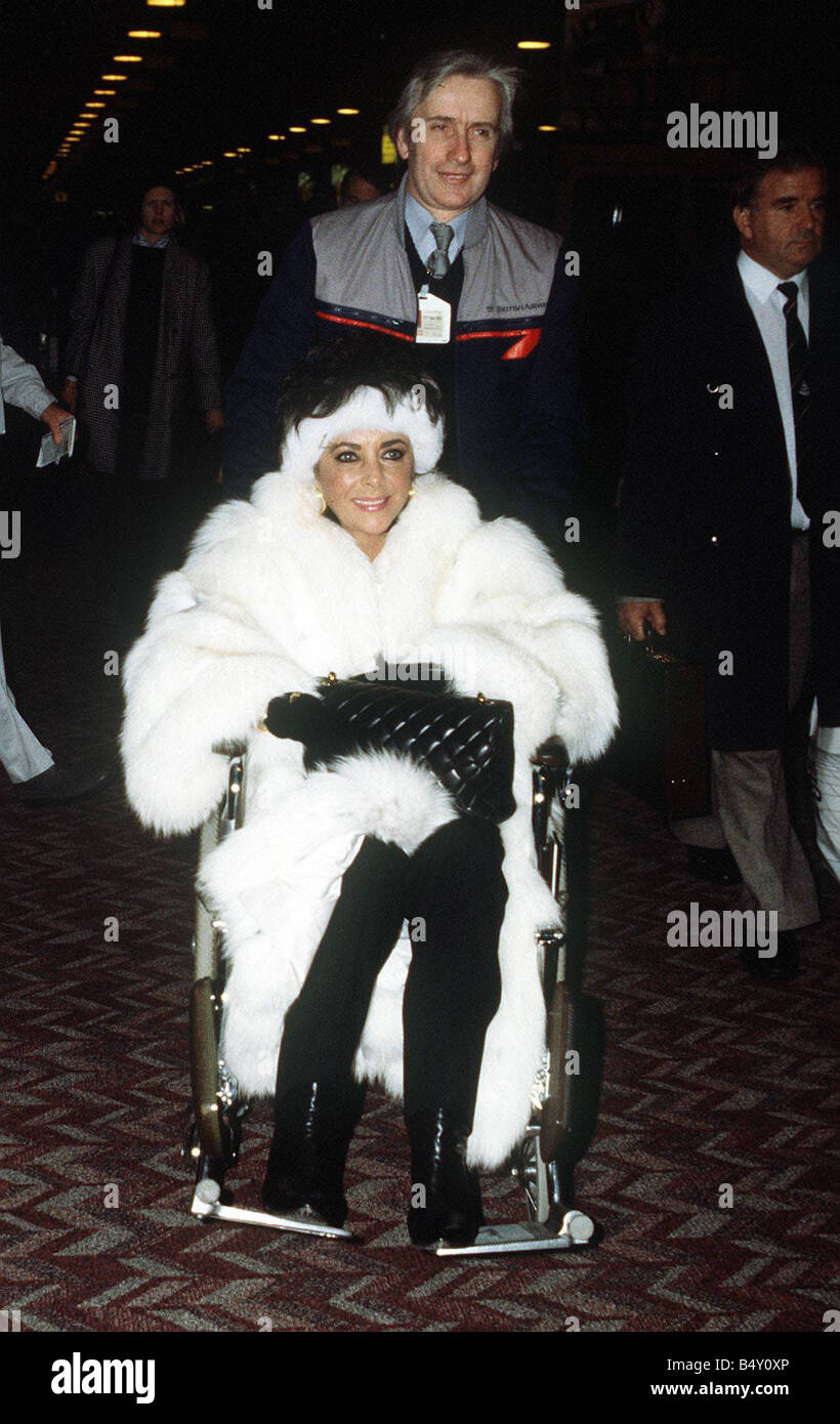 Elizabeth Taylor Jan 1987 wearing White Fur coat in wheelchair at ...
