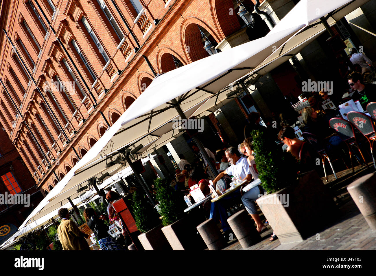 Market stall and canopy with building in background Stock Photo - Alamy