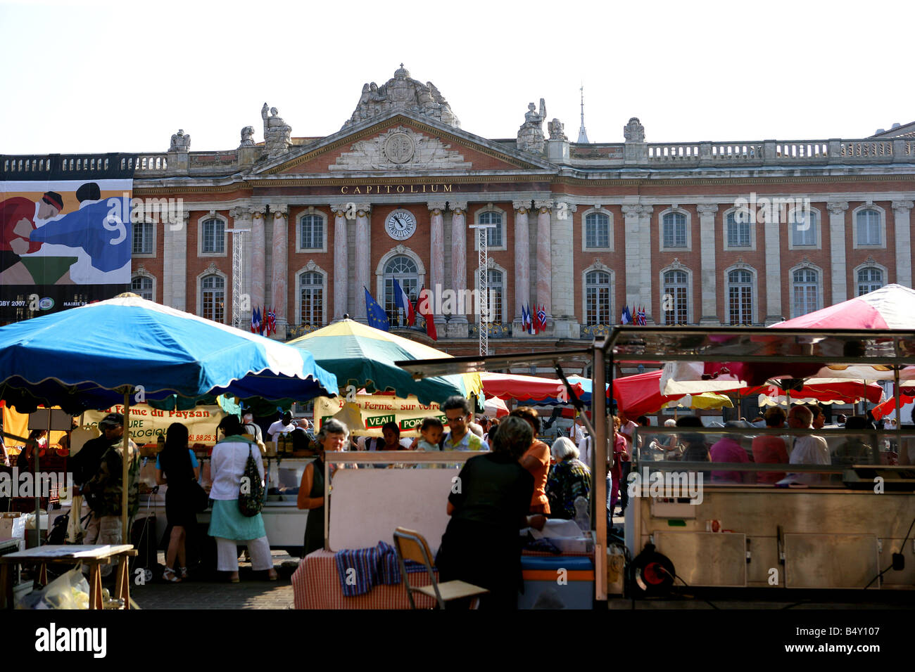 Market stall and canopy with building in background Stock Photo - Alamy