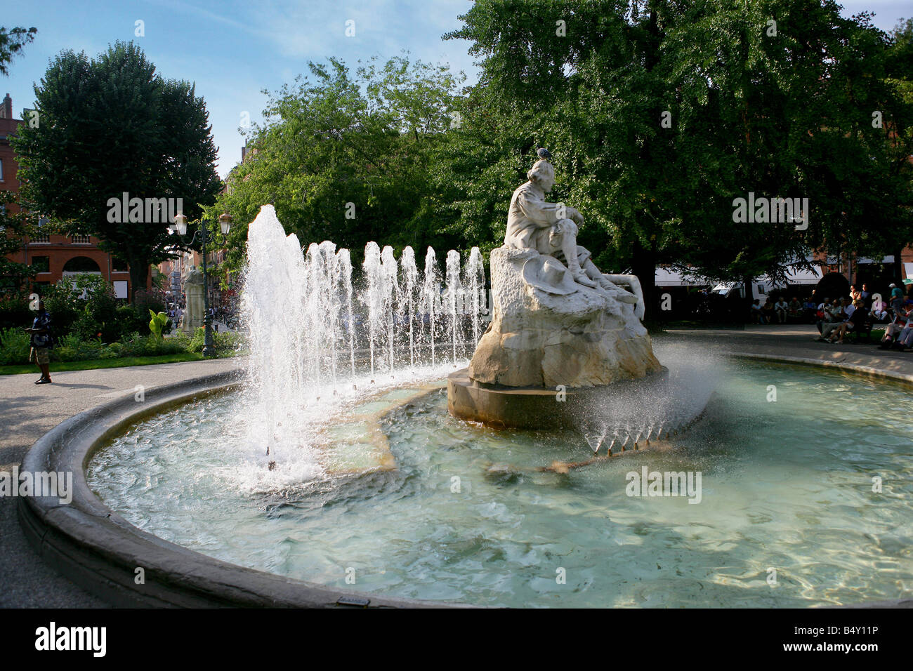 Statue with fountain Stock Photo - Alamy