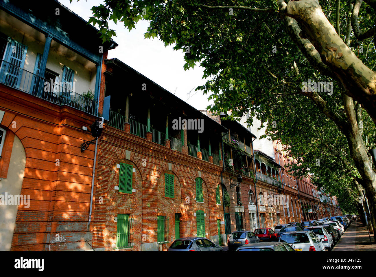 Traffic jam on street by building Stock Photo - Alamy