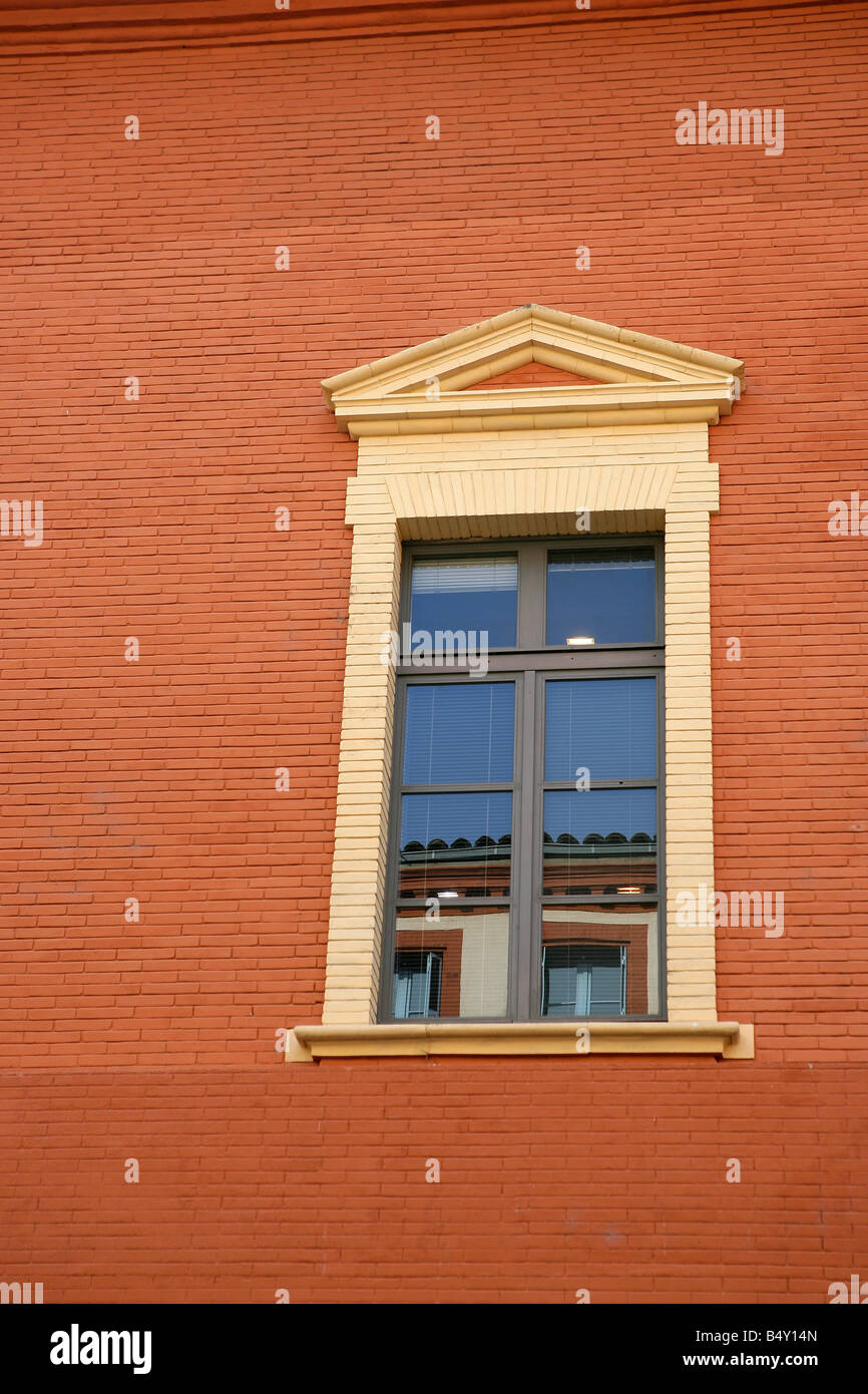 Building exterior with brick wall and window Stock Photo - Alamy