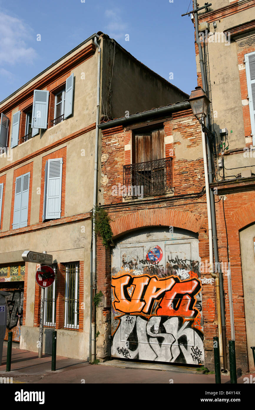 Exterior of a building with graffiti Stock Photo - Alamy