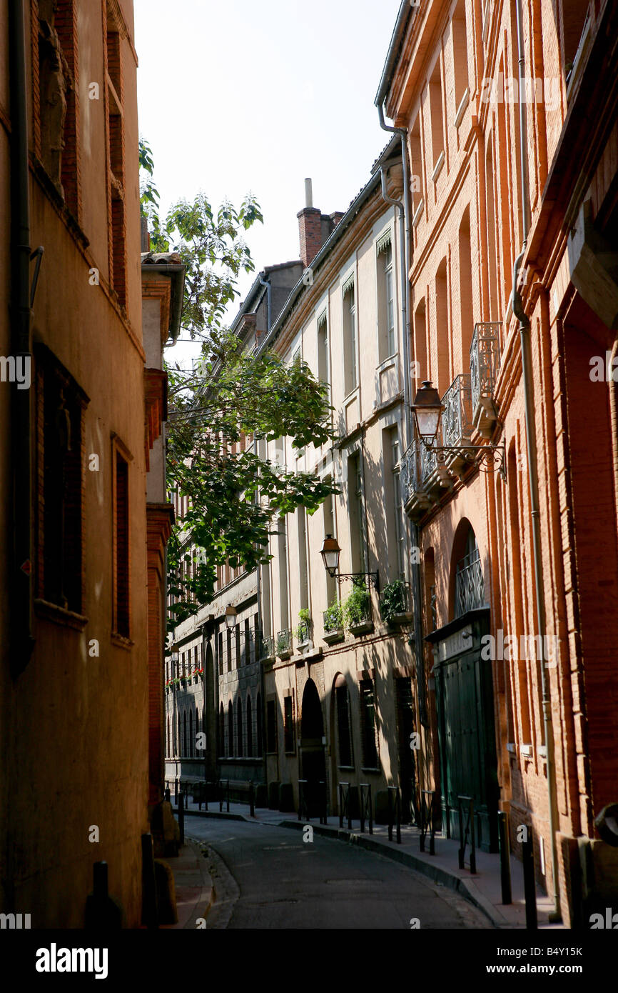 Street amid buildings, low angle view Stock Photo - Alamy