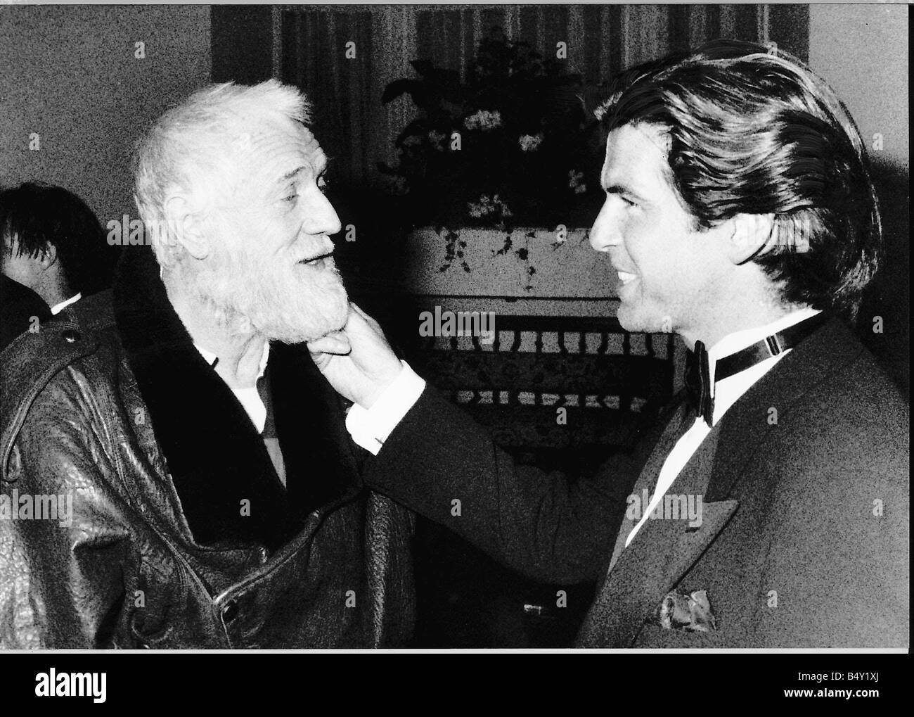 Pierce Brosnan actor pulls Richard Harris s beard Stock Photo - Alamy