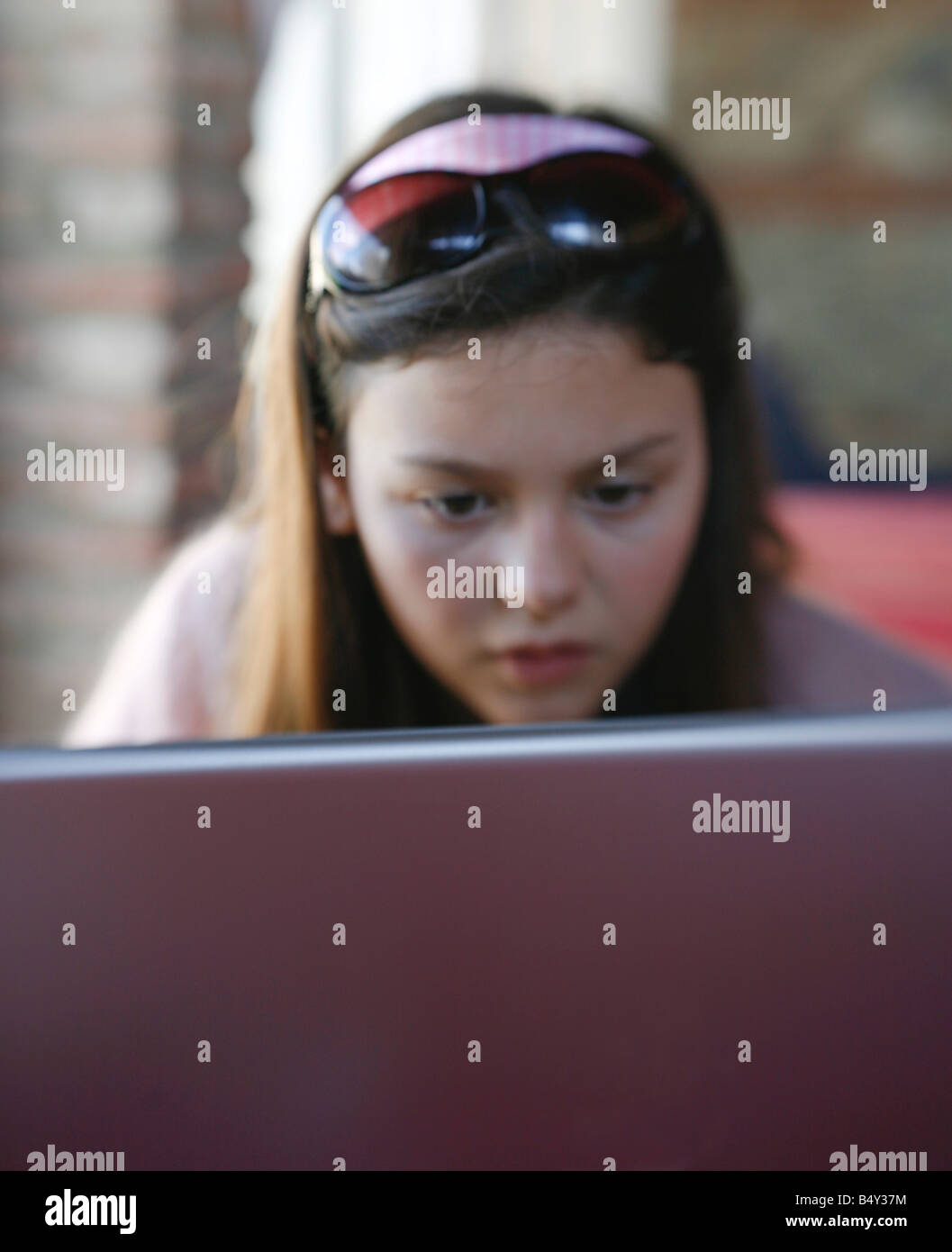 young girl with laptop Stock Photo - Alamy