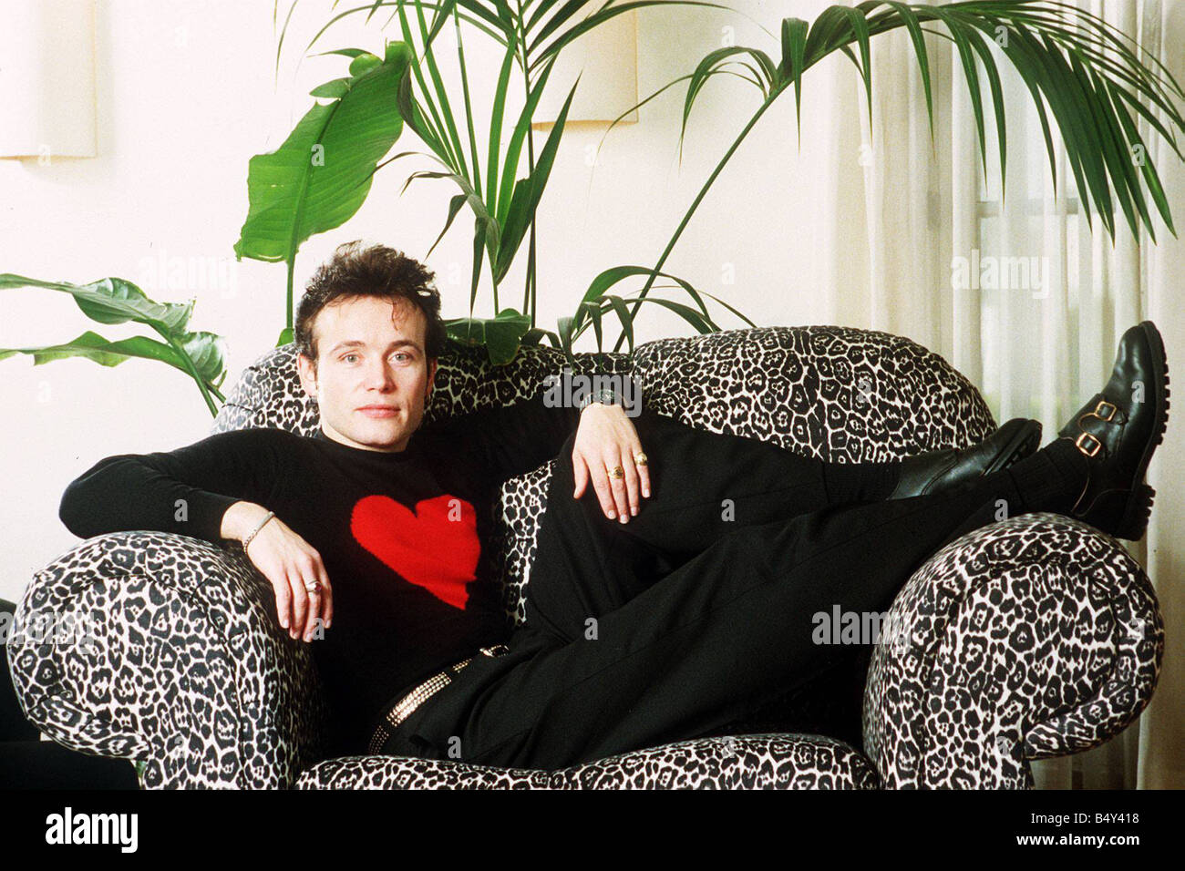 Adam Ant singer sits in chair Stuart Goddard Stock Photo - Alamy