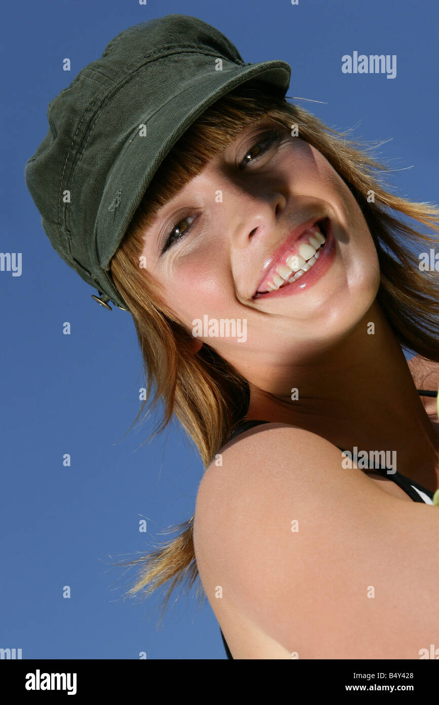 Portrait of a young woman wearing a cap Stock Photo - Alamy
