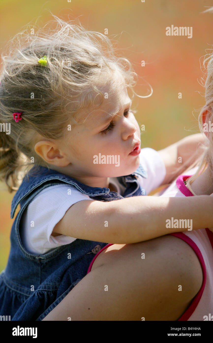 child catching at his mother Stock Photo - Alamy