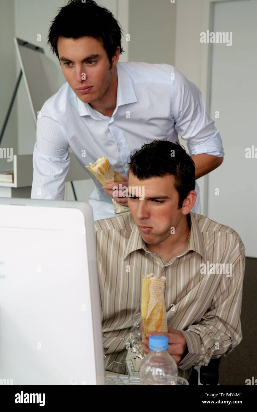 young men with a computer Stock Photo - Alamy