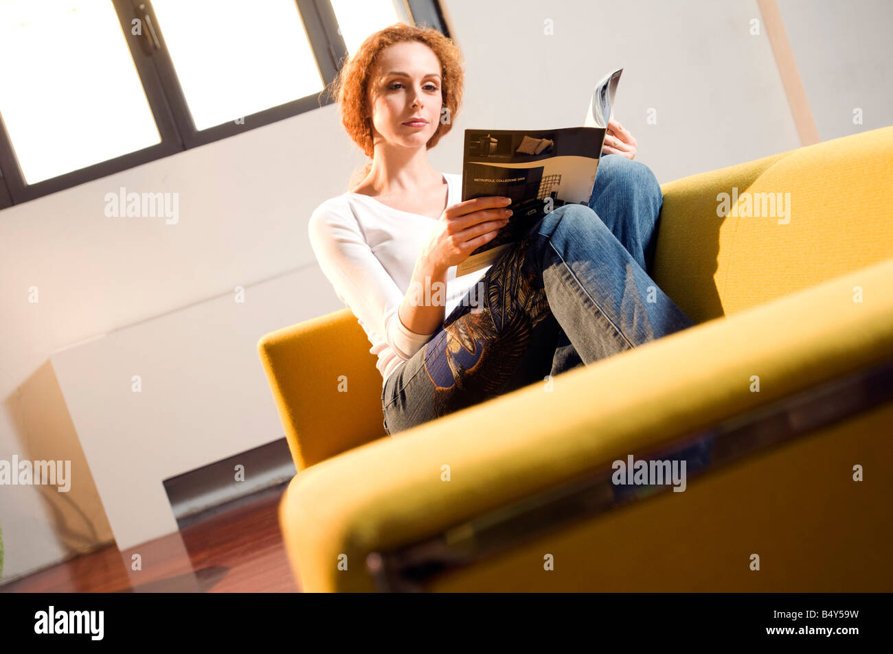 woman reading a magazine Stock Photo - Alamy