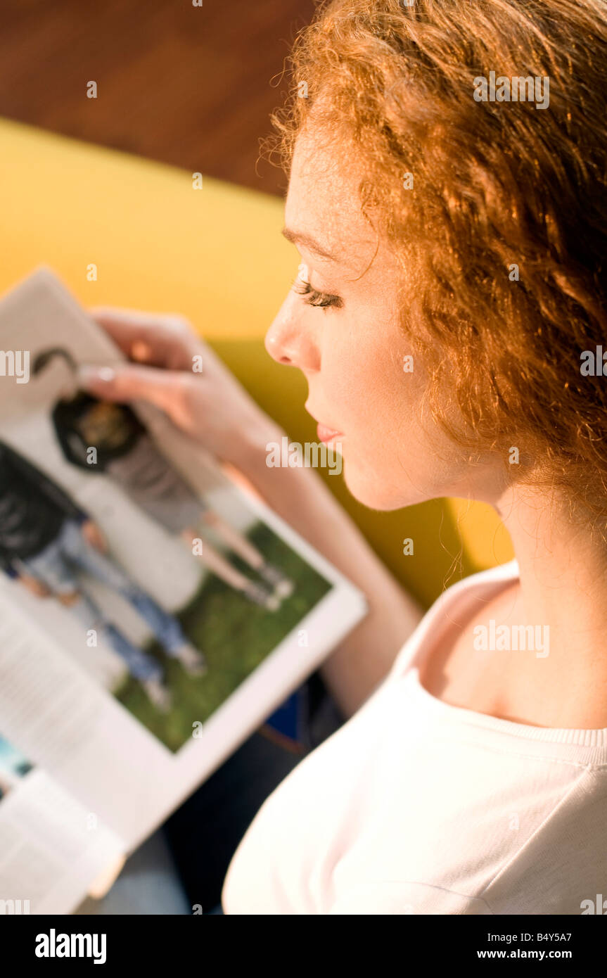 woman reading a magazine Stock Photo - Alamy