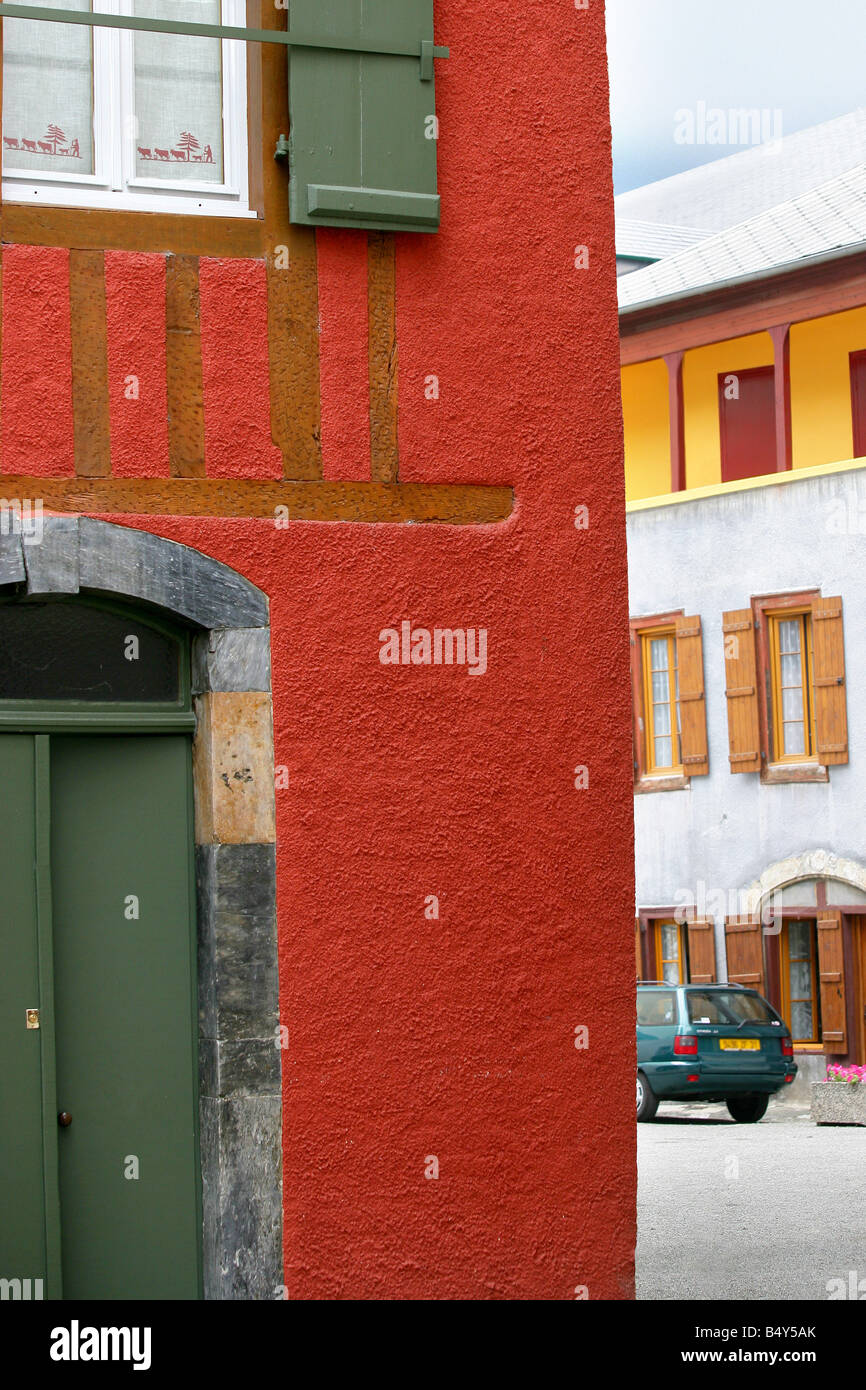 Red painted wall with door, close-up Stock Photo - Alamy
