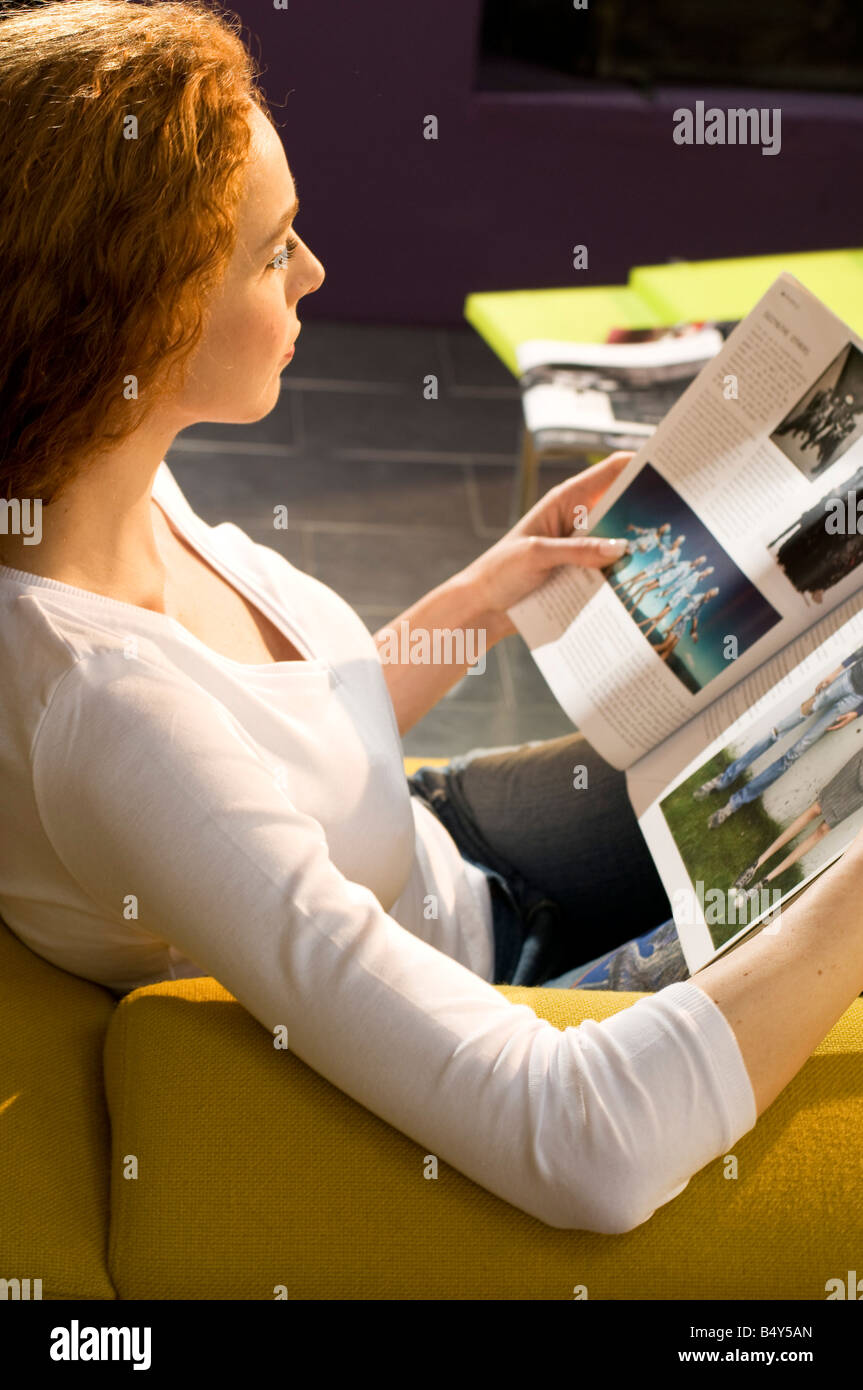 woman reading a magazine Stock Photo - Alamy