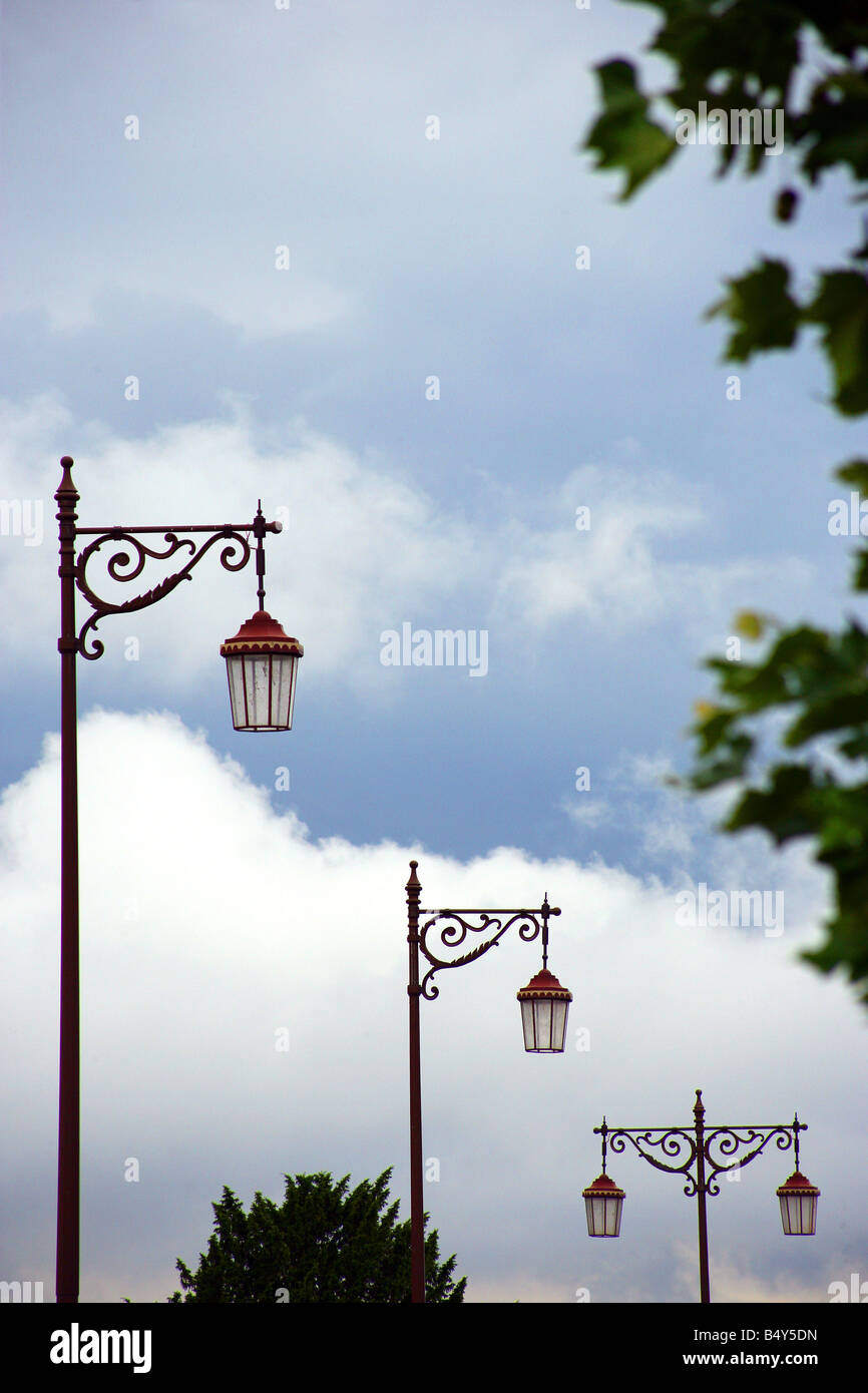 Lampposts in row, low angle view Stock Photo - Alamy