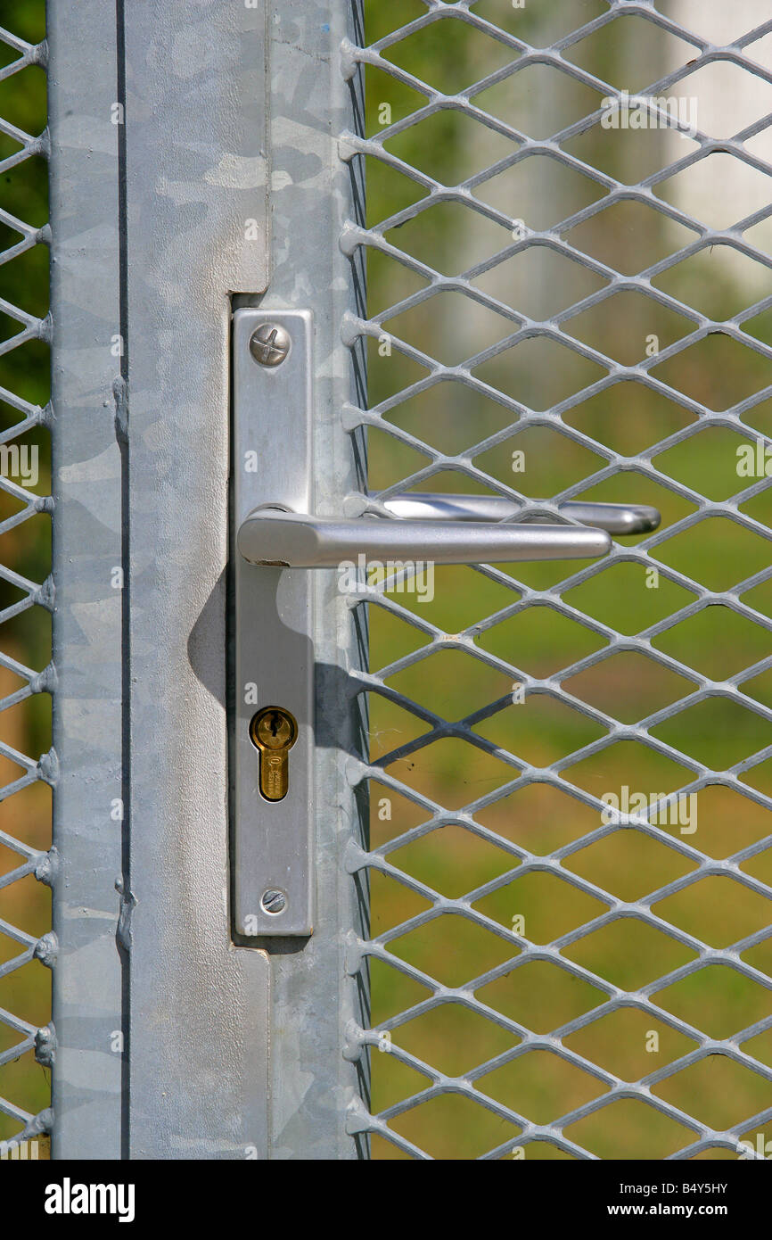 Handle on gate, close-up Stock Photo - Alamy
