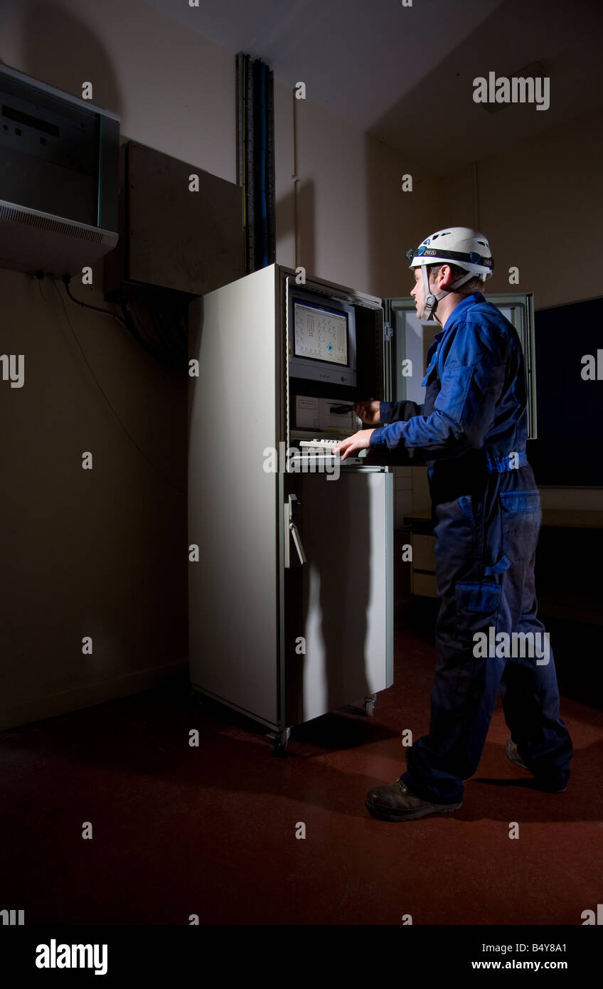 Interior of computerised control room with controller showing power ...