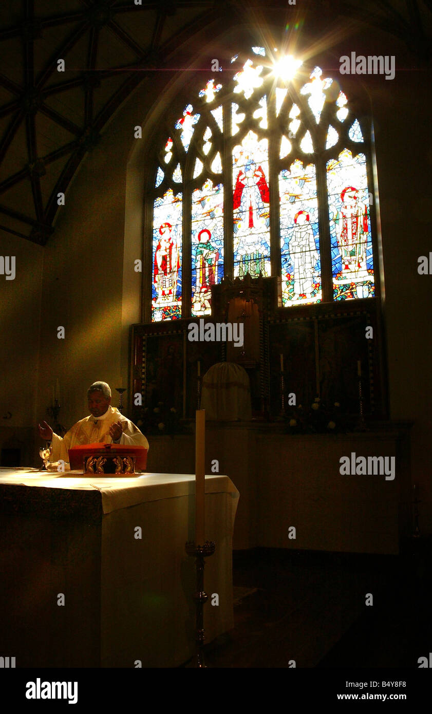 Catholic communion priest hi-res stock photography and images - Alamy