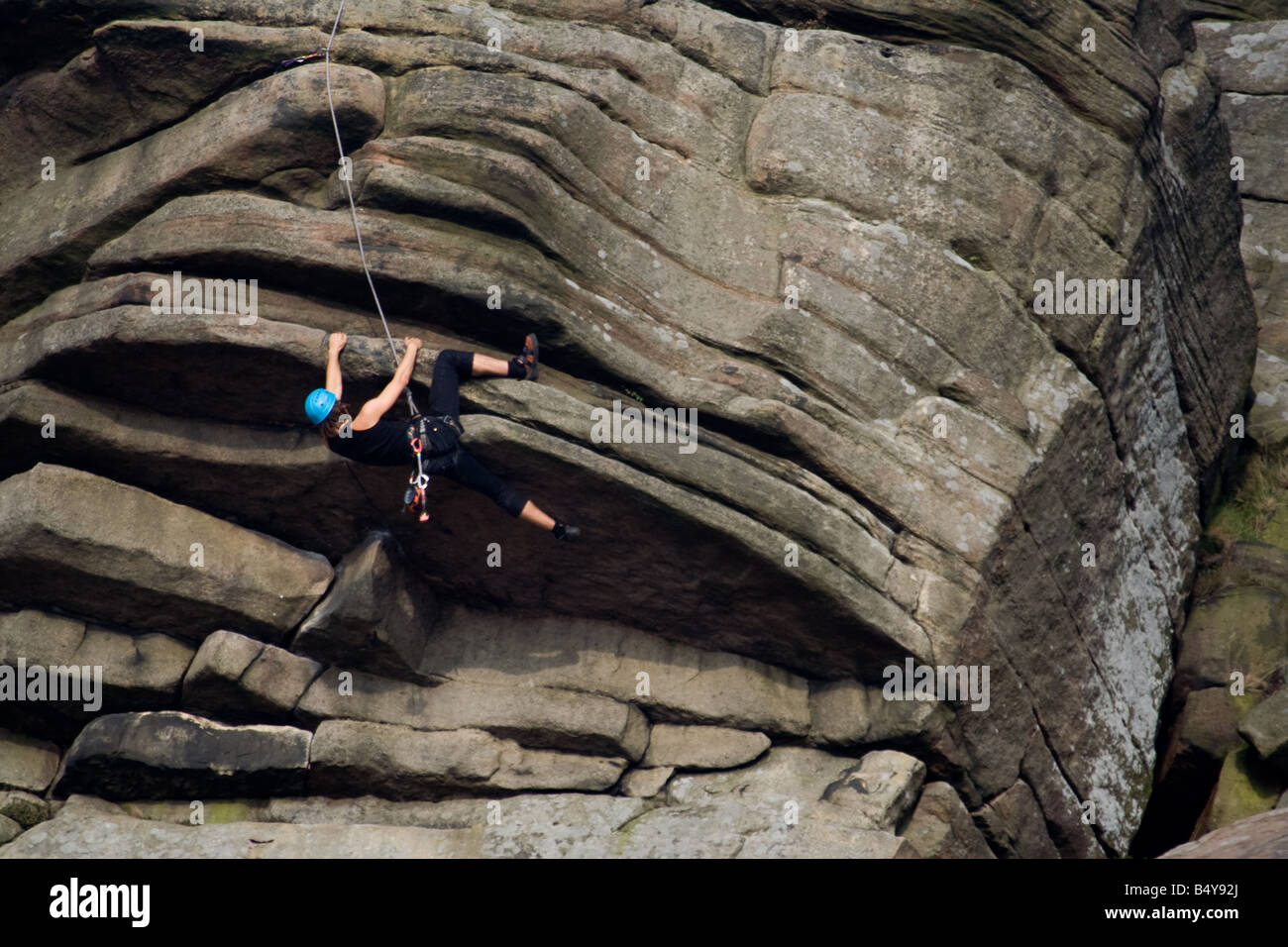 Climber on Rock Face Overhang Stock Photo - Alamy