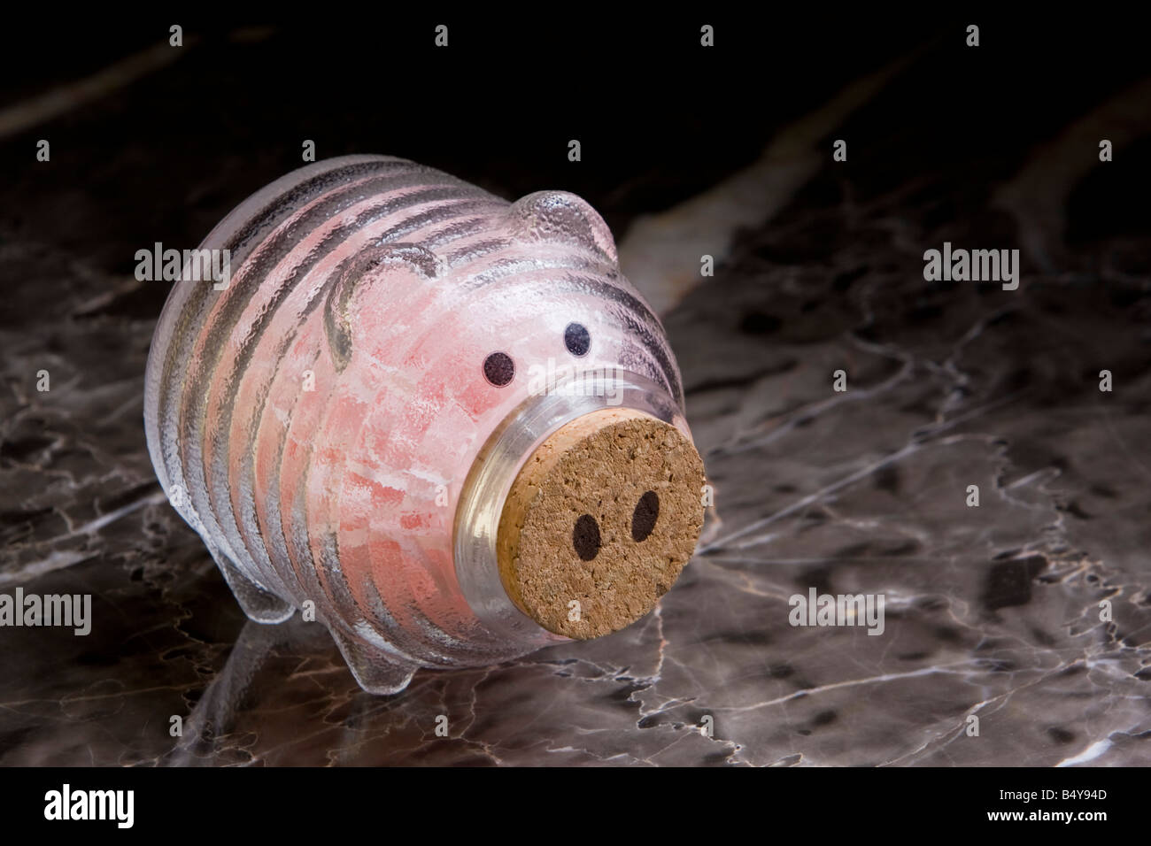 glass piggy bank on marble counter Stock Photo - Alamy