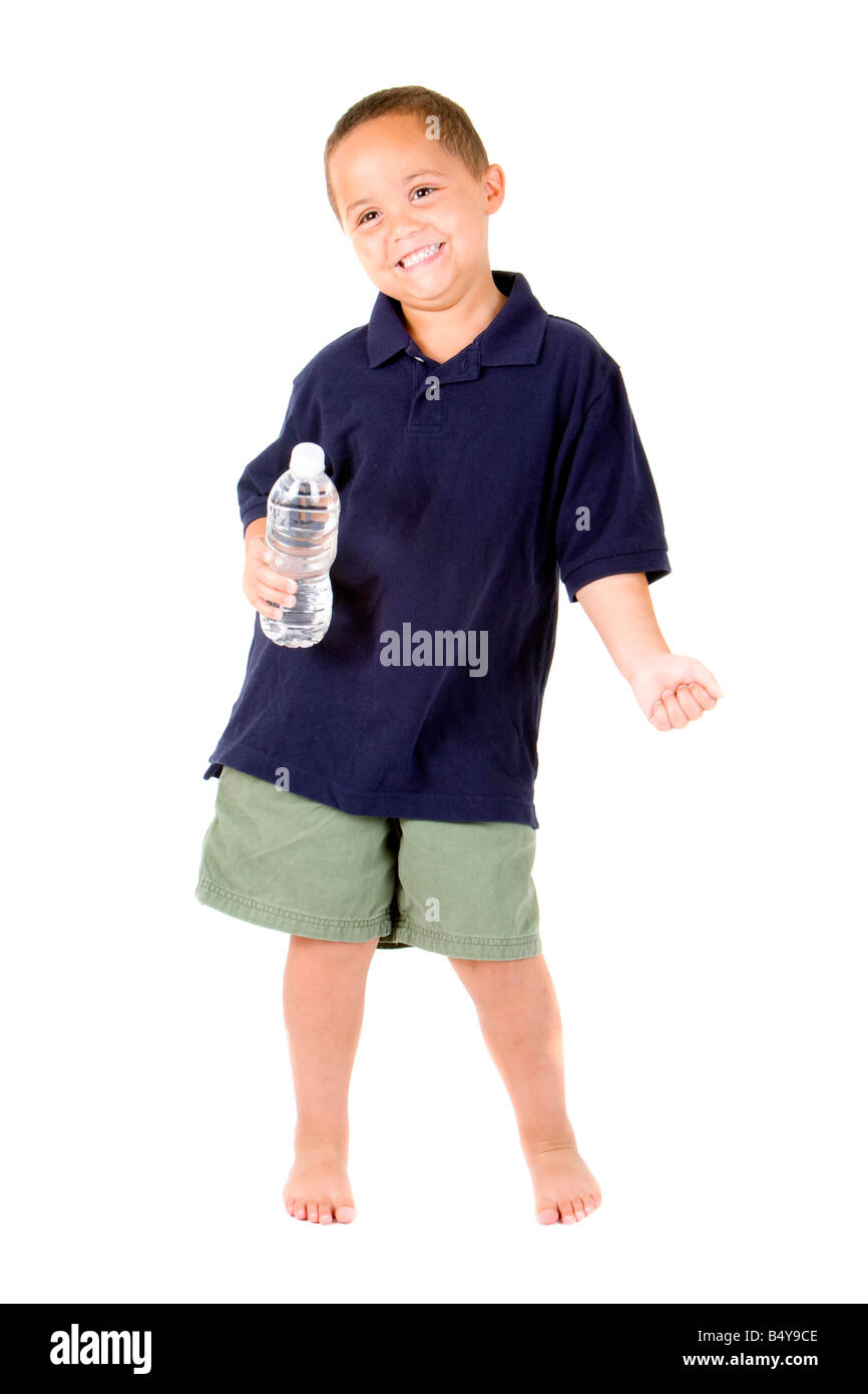 Happy latino boy dancing with water bottle on white background Stock ...
