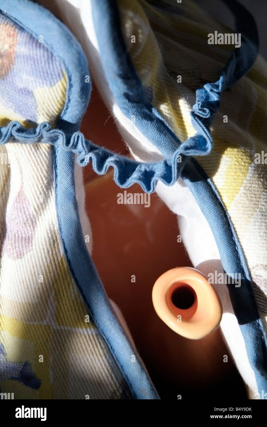 colourful ''tea cosy'' and teapot spout Stock Photo - Alamy