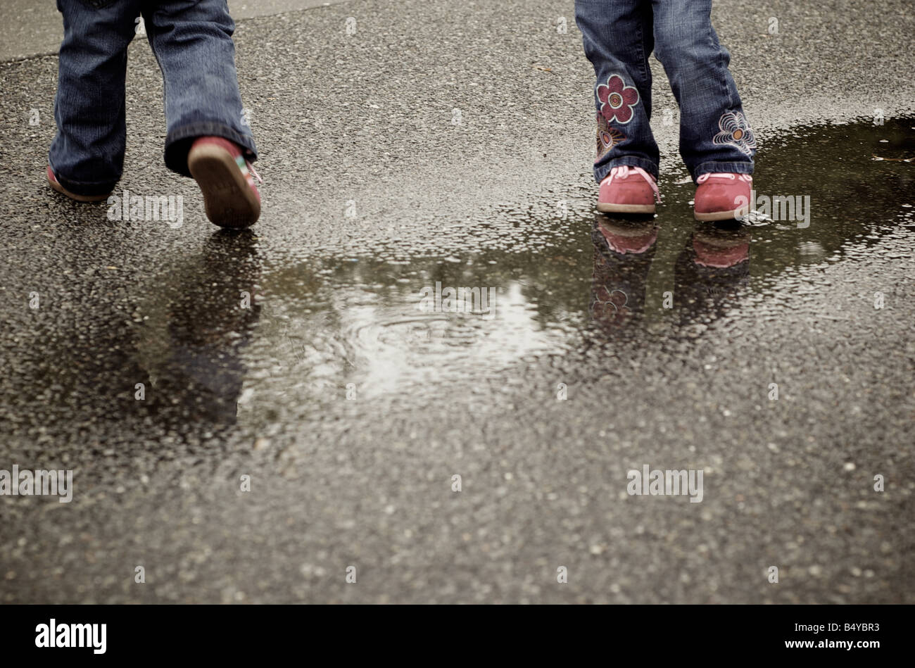 Children puddles hi-res stock photography and images - Alamy
