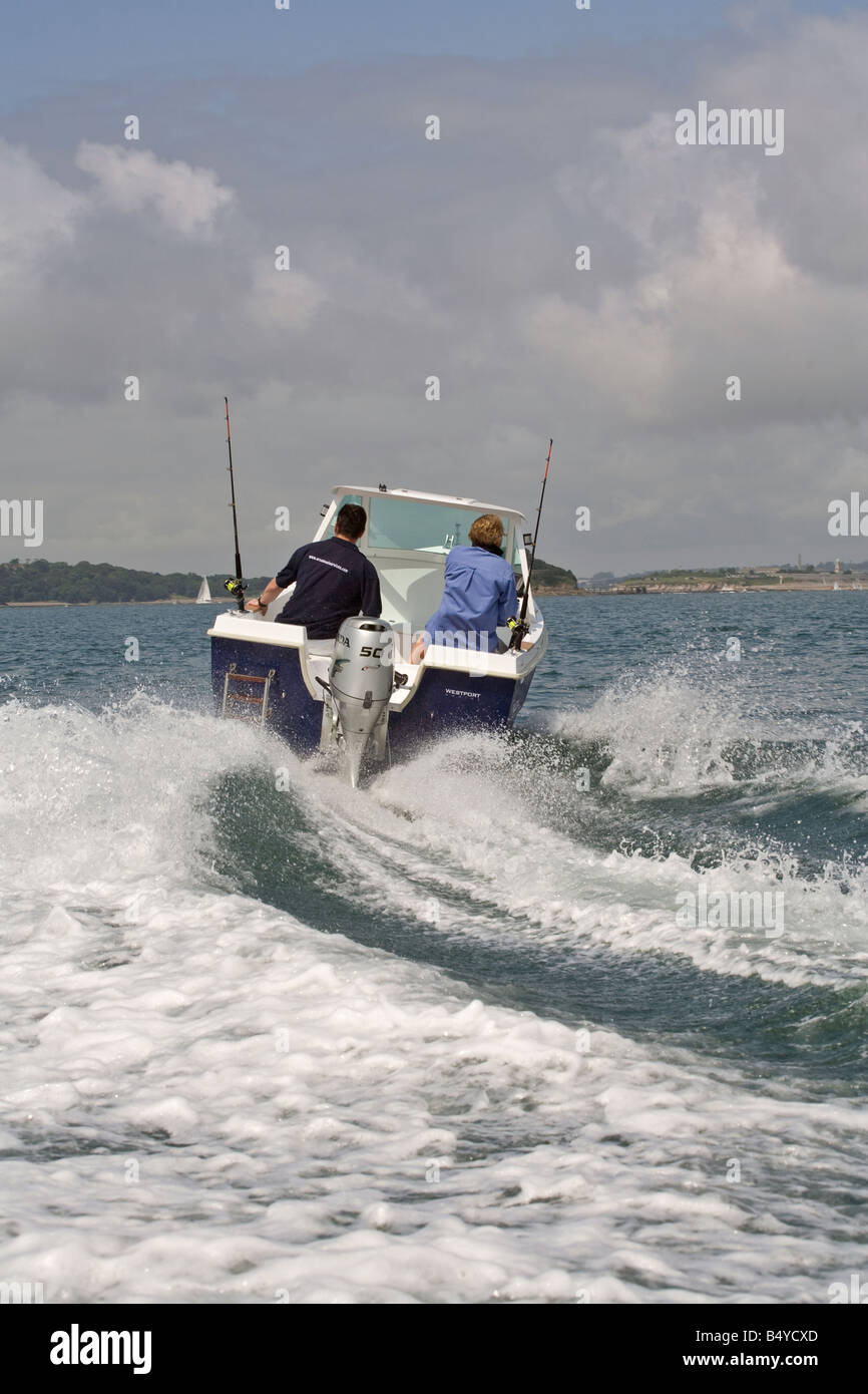 Small angling boat at Speed, Stern View Stock Photo - Alamy