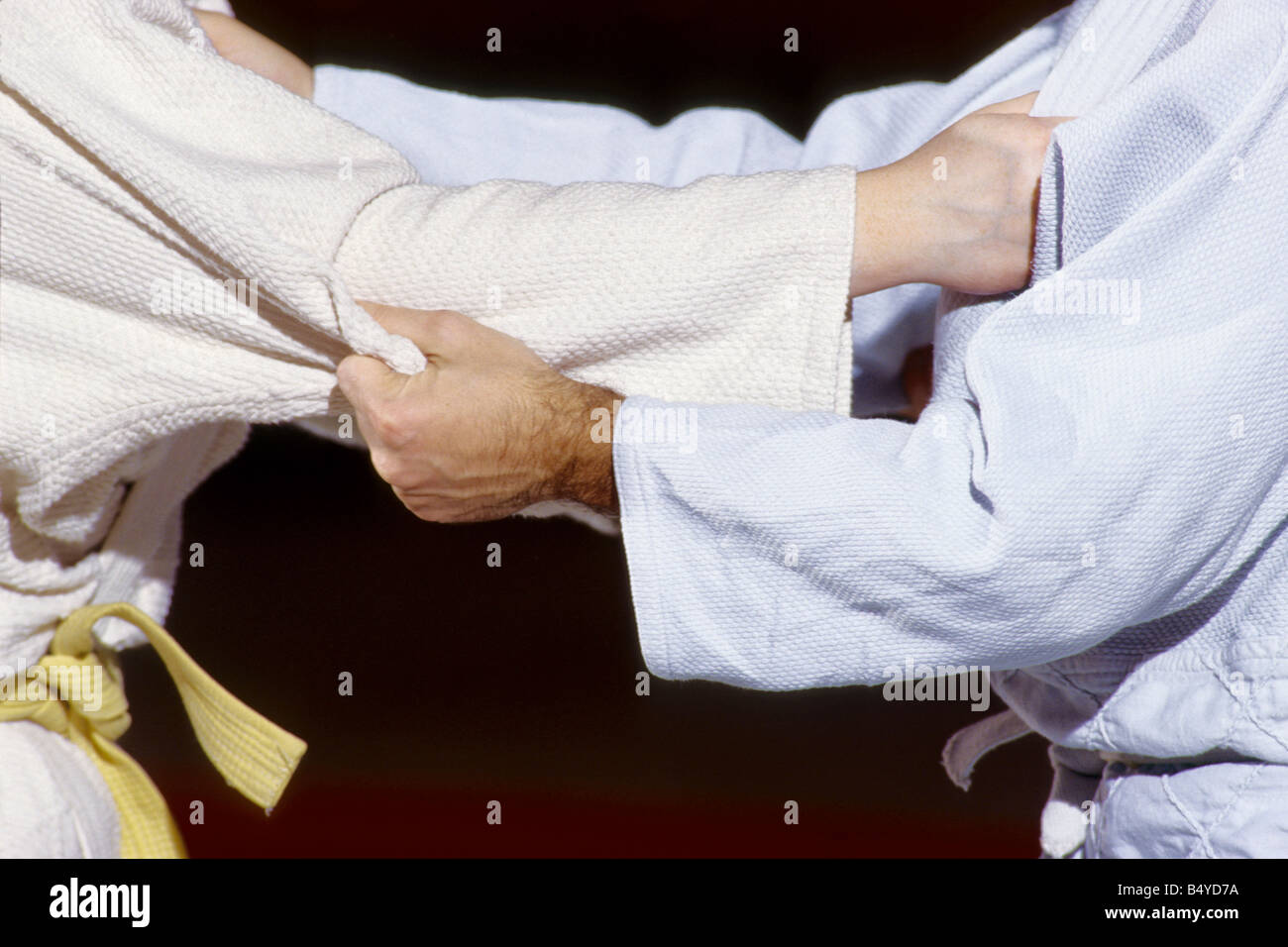 Detail of the hands of judo competitors in action Stock Photo - Alamy