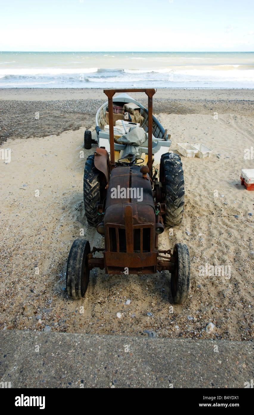 Tractor and fishing boat at Cromer Stock Photo - Alamy