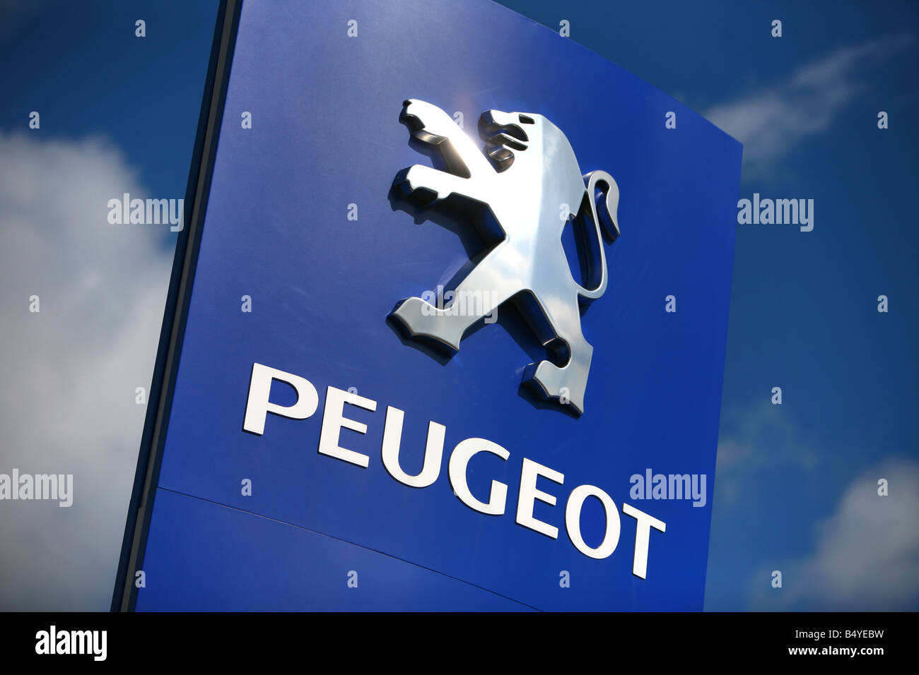 Peugeot sign with chrome logo Stock Photo - Alamy