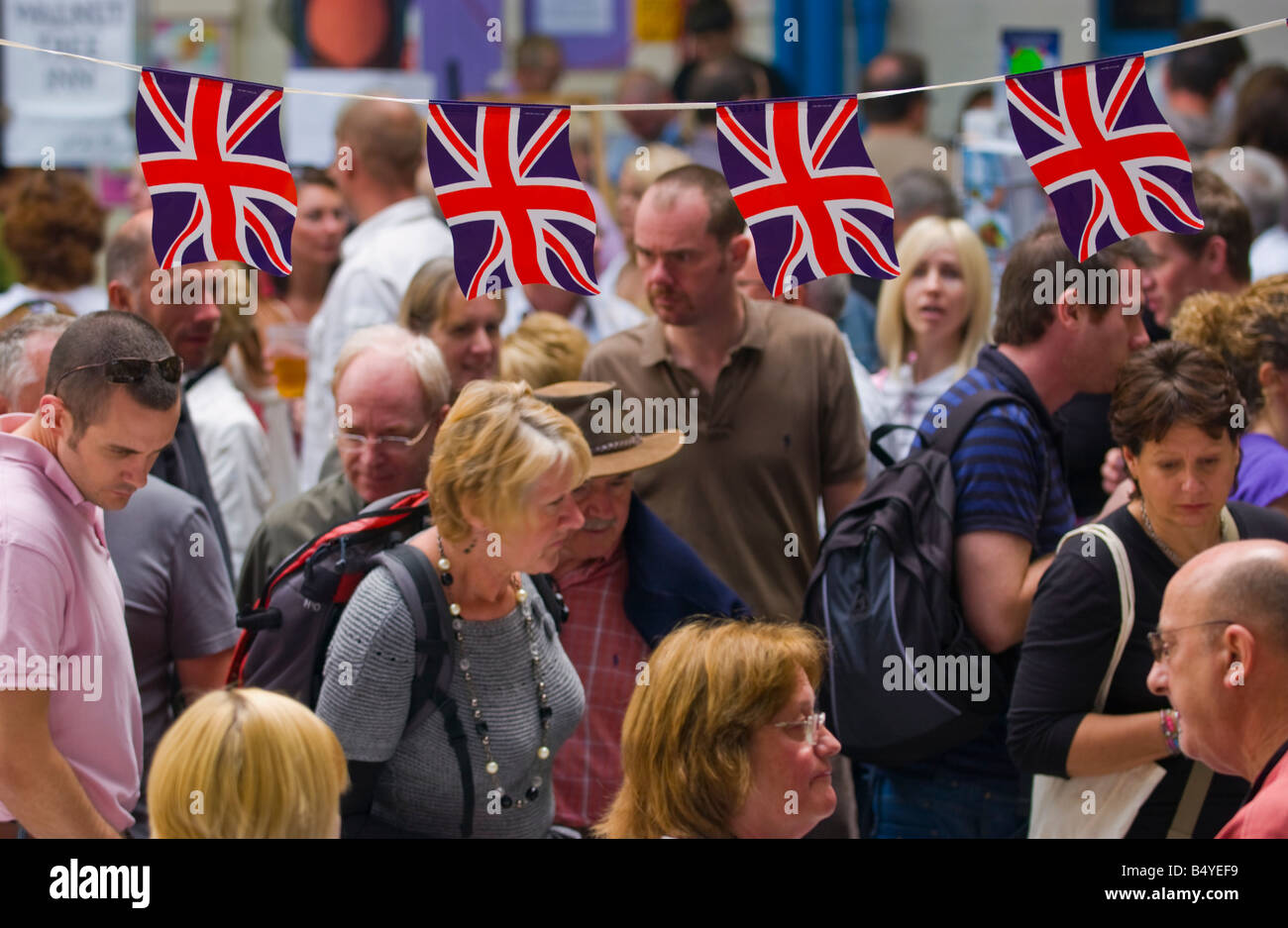Union Jack bunting flags with crowd of people at Abergavenny Food ...