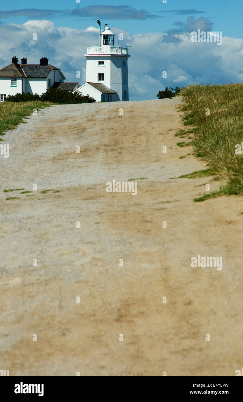 Lighthouse and path Stock Photo - Alamy
