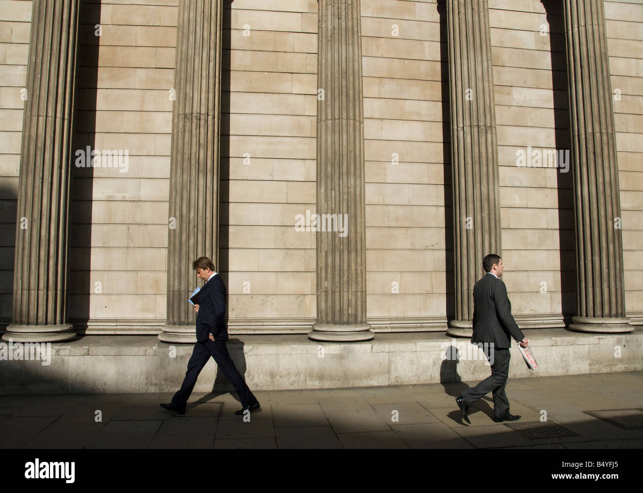 People walking in Threadneedle Street outside the bank of England Stock ...