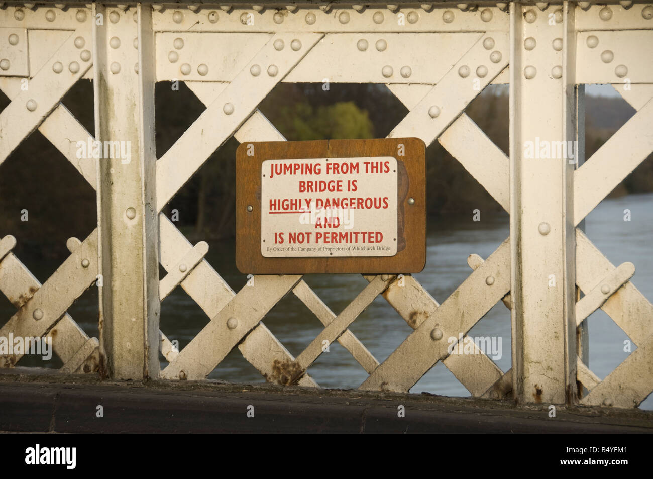 Sign on Whitchurch Bridge over the River Thames at Pangbourne saying ...
