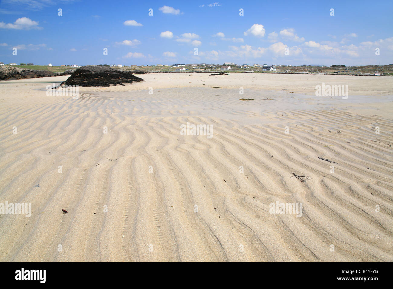 causeway across the beach from Claddaghduff to Omey Island during low ...