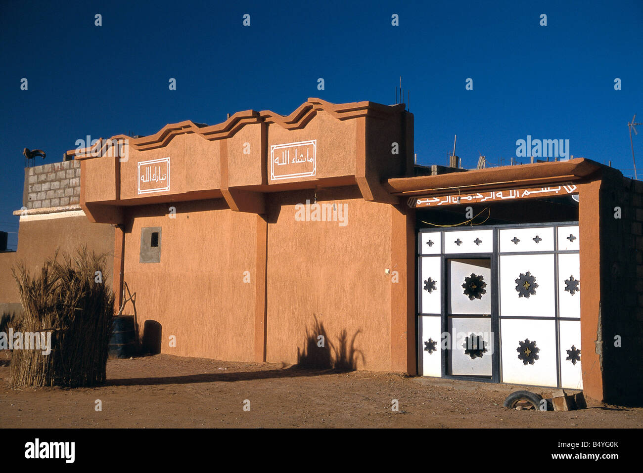 Libya Al Aweinat A typical modern house in an oasis town in the Sahara ...