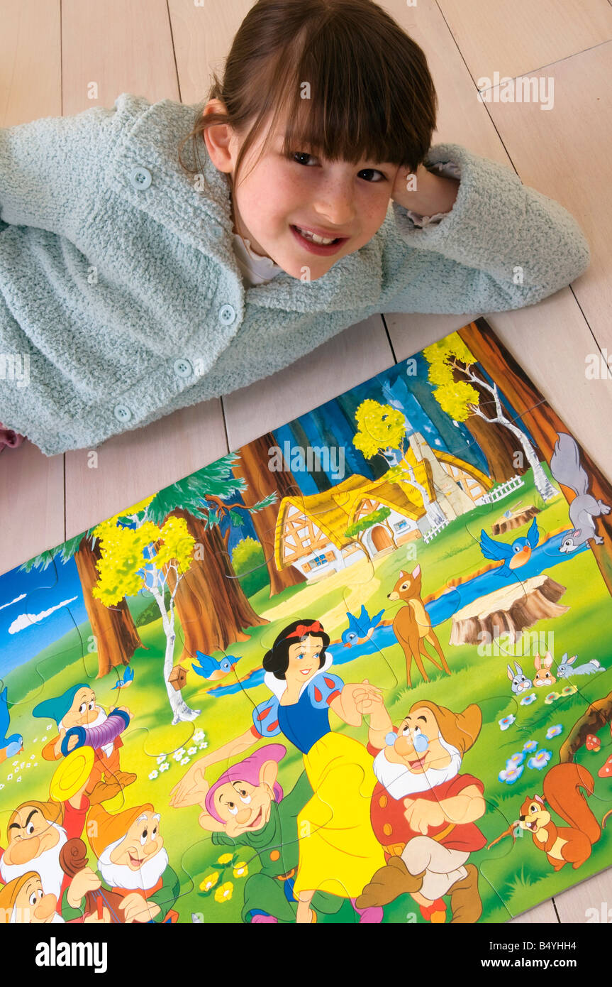little girl and puzzle Stock Photo - Alamy