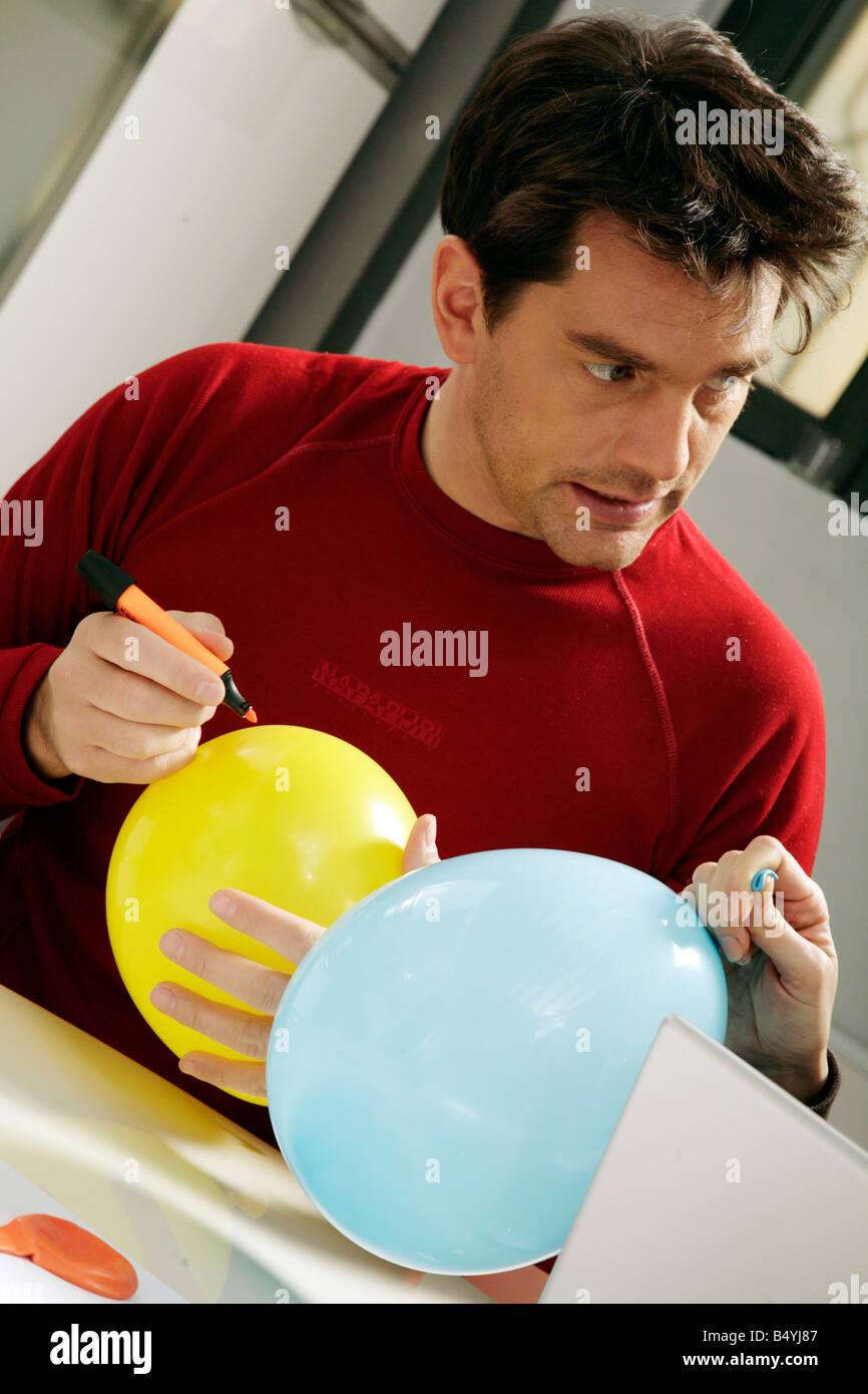 man with balloons Stock Photo - Alamy