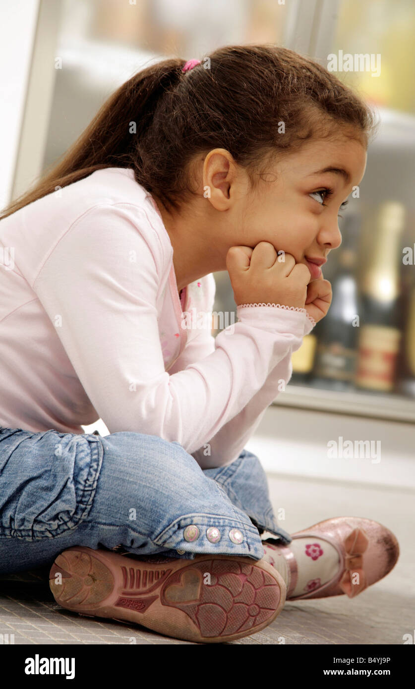 sitted little girl Stock Photo - Alamy