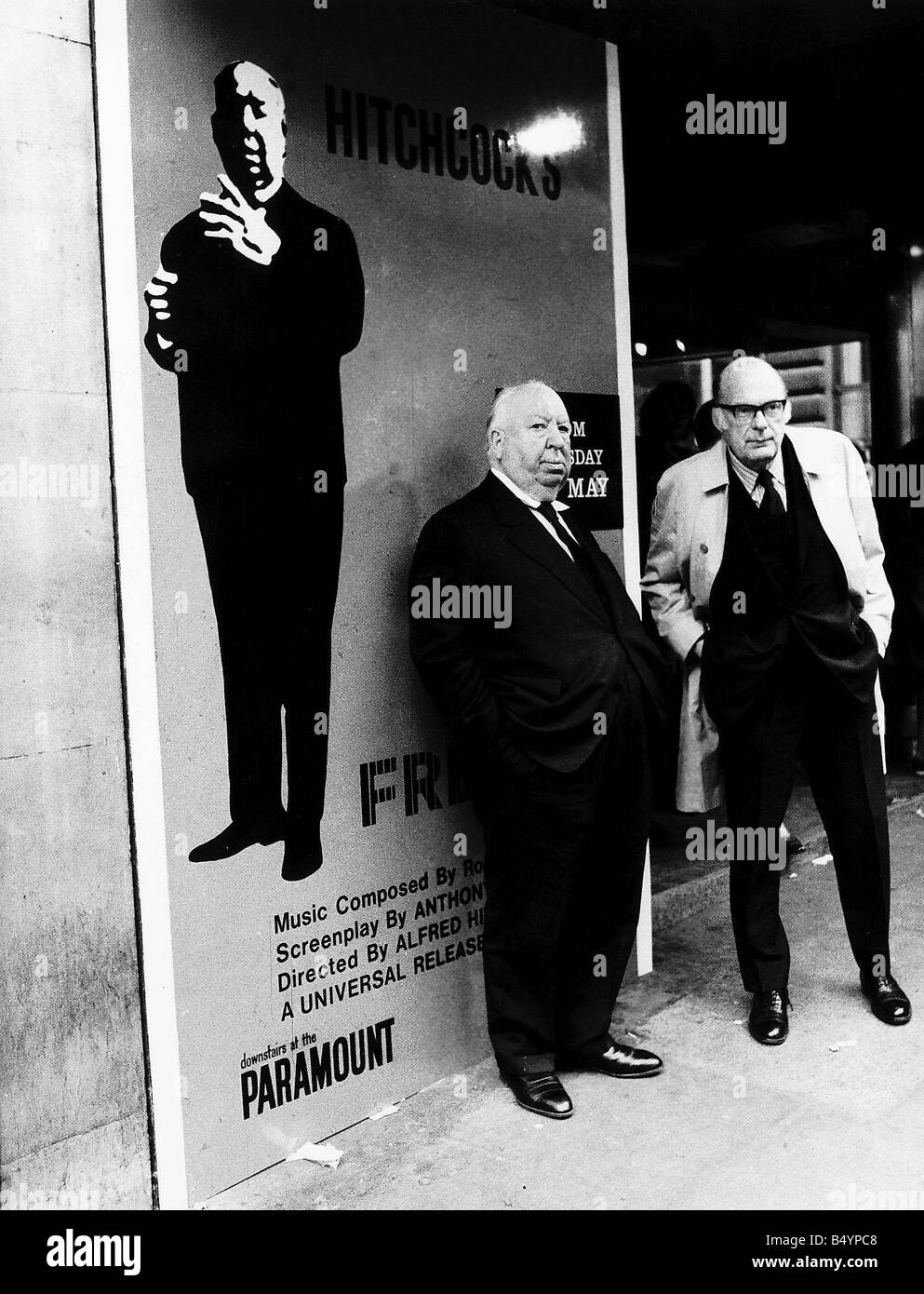 Alfred Hitchcock film director outside the Plaza Cinema in Londons ...