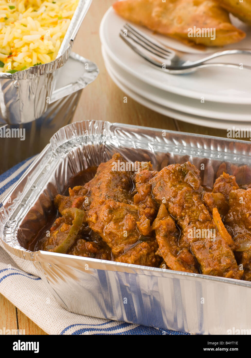 Indian Take Away- Beef Madras, Pilau Rice And Vegetable Samosa Stock ...