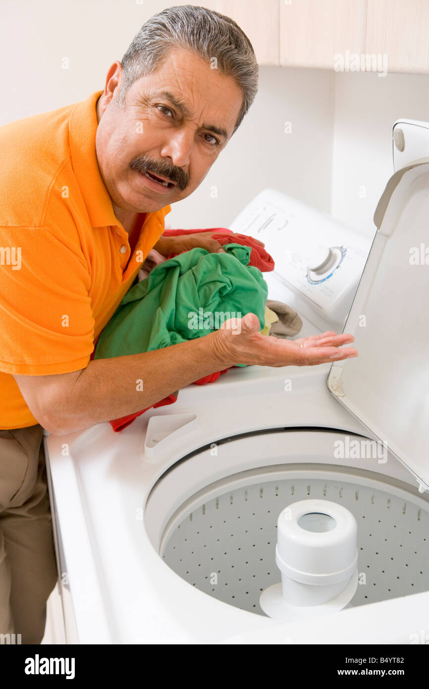 Man Doing Laundry Stock Photo - Alamy