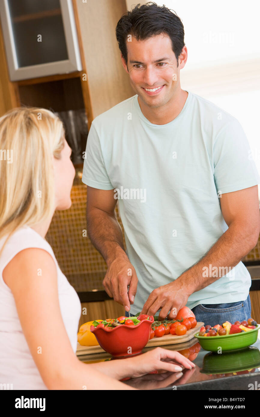 Husband And Wife Preparing Dinner Stock Photo - Alamy