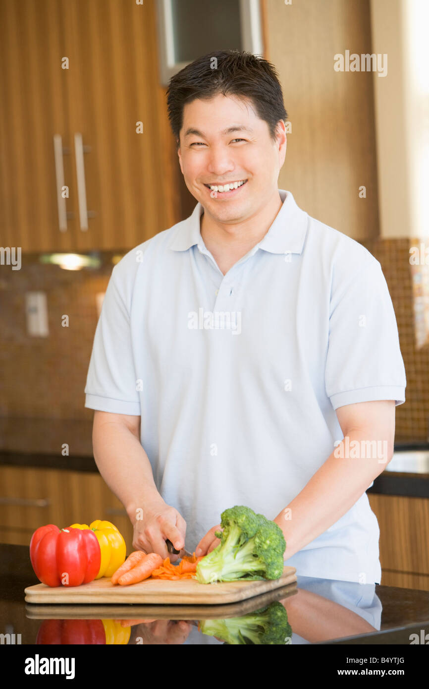 Man Chopping Vegetables Stock Photo - Alamy
